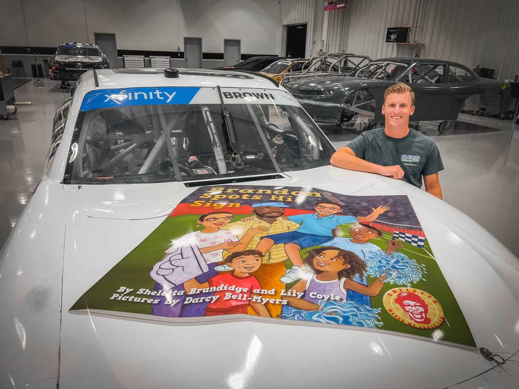 Brandon Brown is Bringing Autism Awareness to NASCAR One Sign at a Time