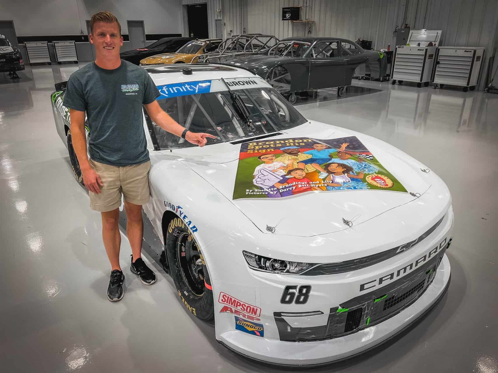 Brandon Brown is Bringing Autism Awareness to NASCAR One Sign at a Time