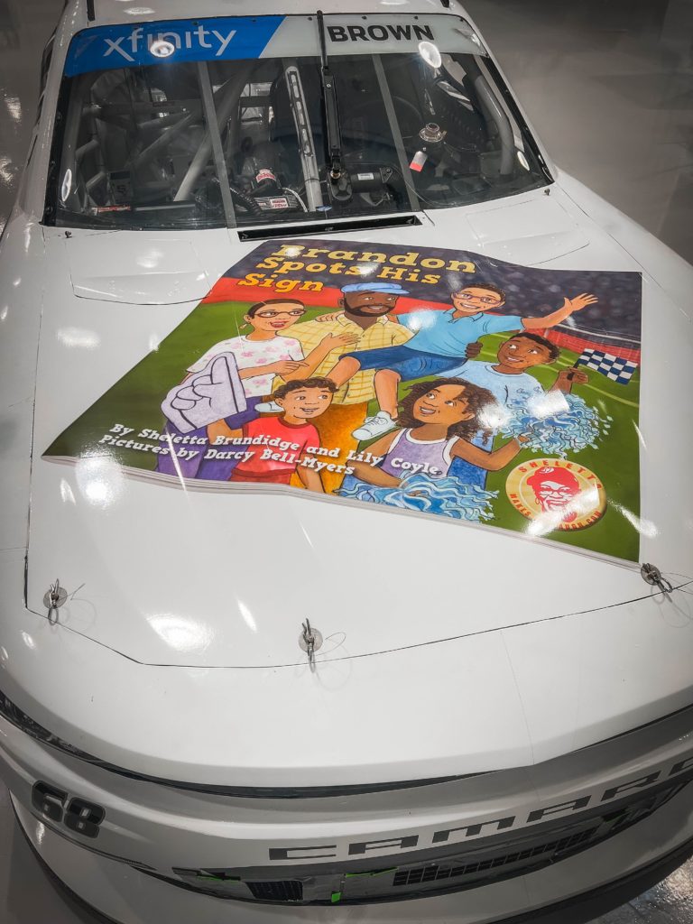 Brandon Brown is Bringing Autism Awareness to NASCAR One Sign at a Time